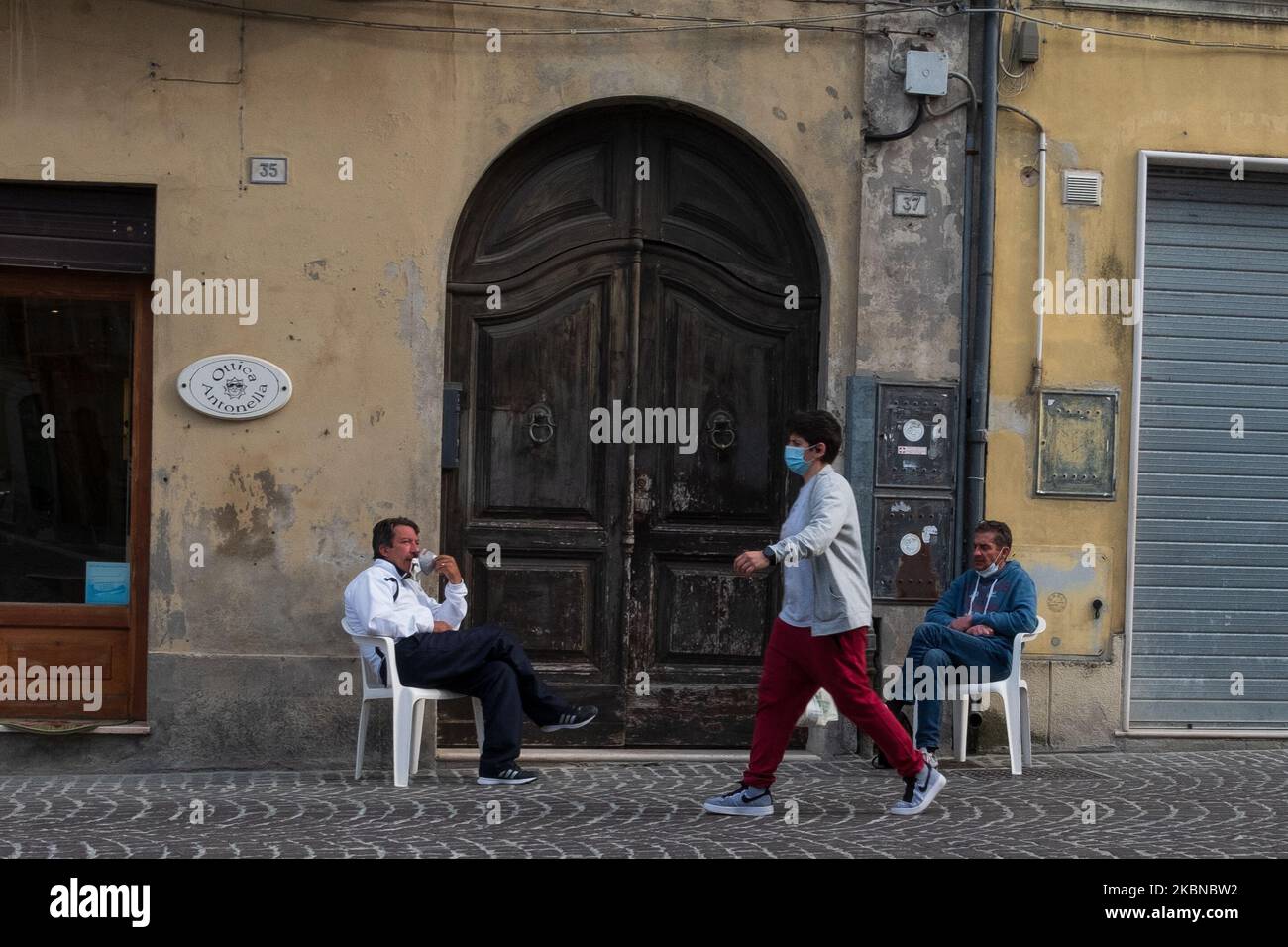 A woman walk during the second day of Fase 2 (phase 2) in Italy after ...