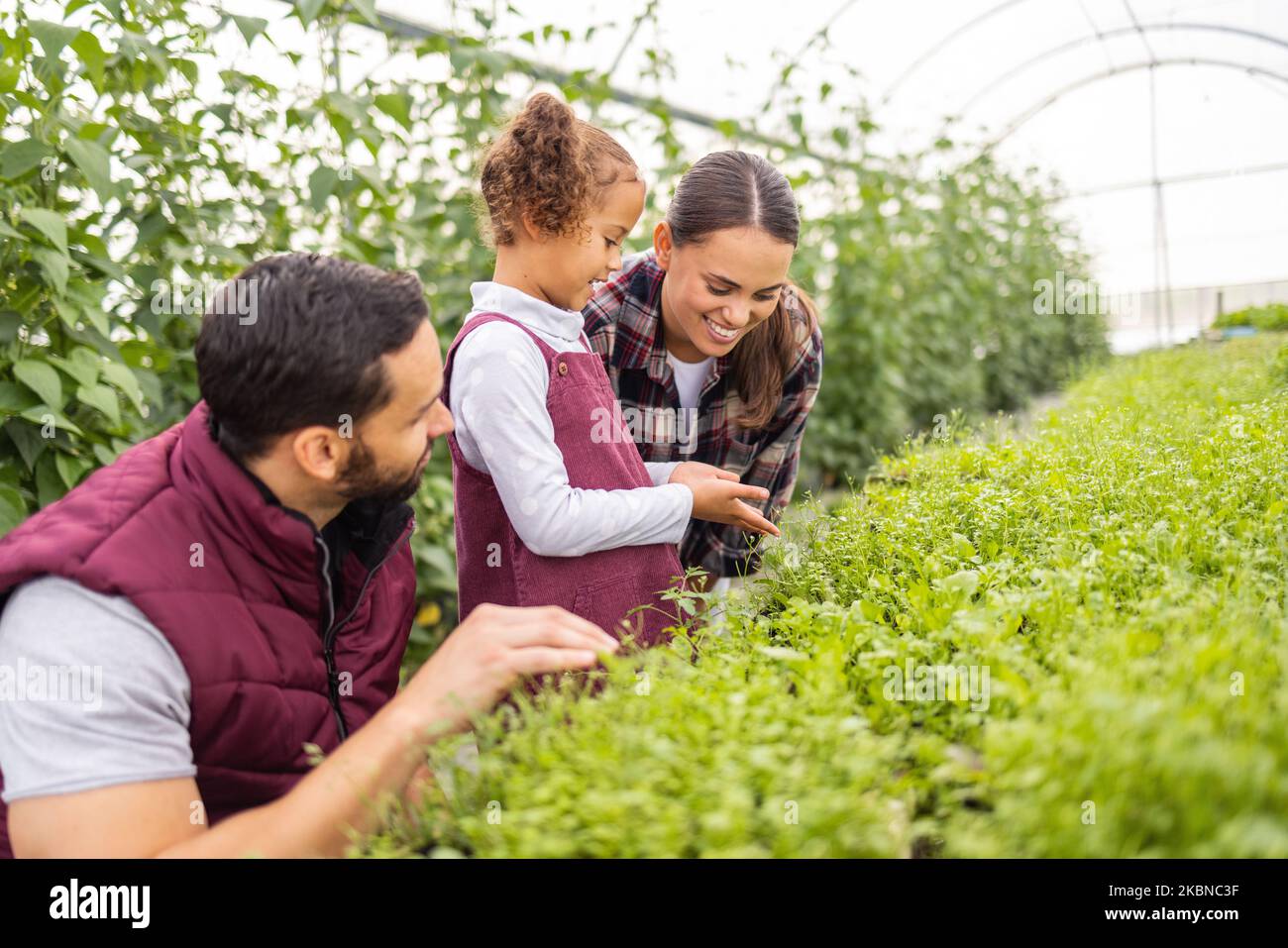 Farming, agriculture and family with child and parents happy together ...