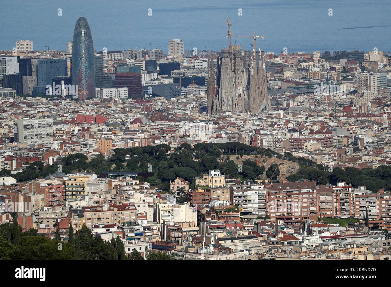 The Sagrada Familia and the Glorias Tower. Barcelona reaches historic ...