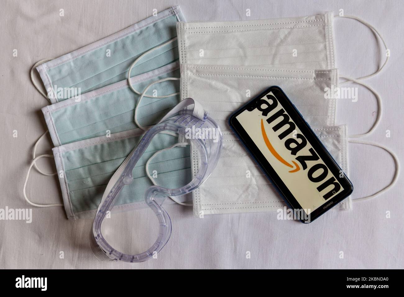 For illustrative purposes a mobile phone with a Amazon logo is ...