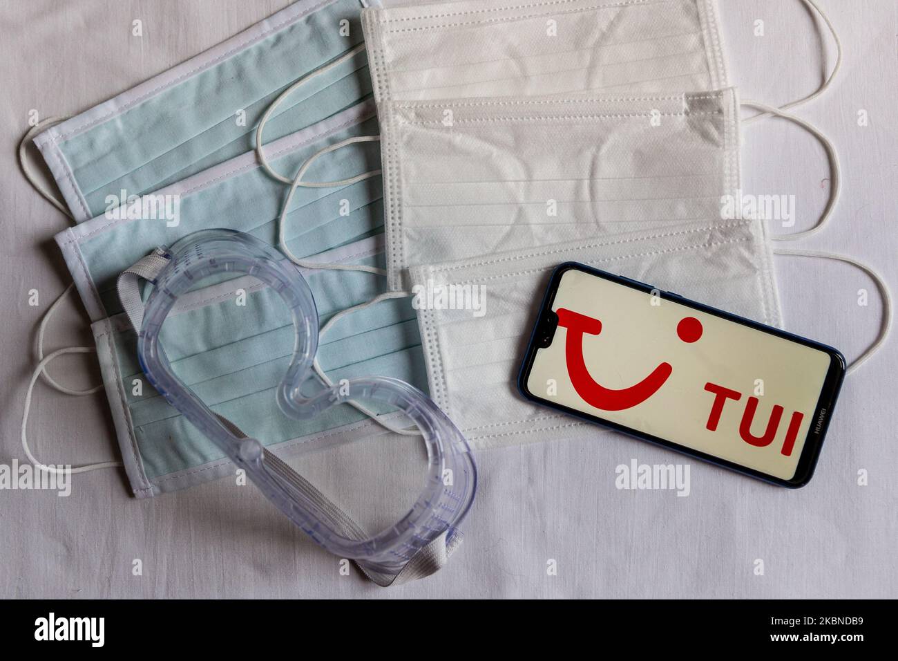 For illustrative purposes a mobile phone with a TUI logo is illustrated ...