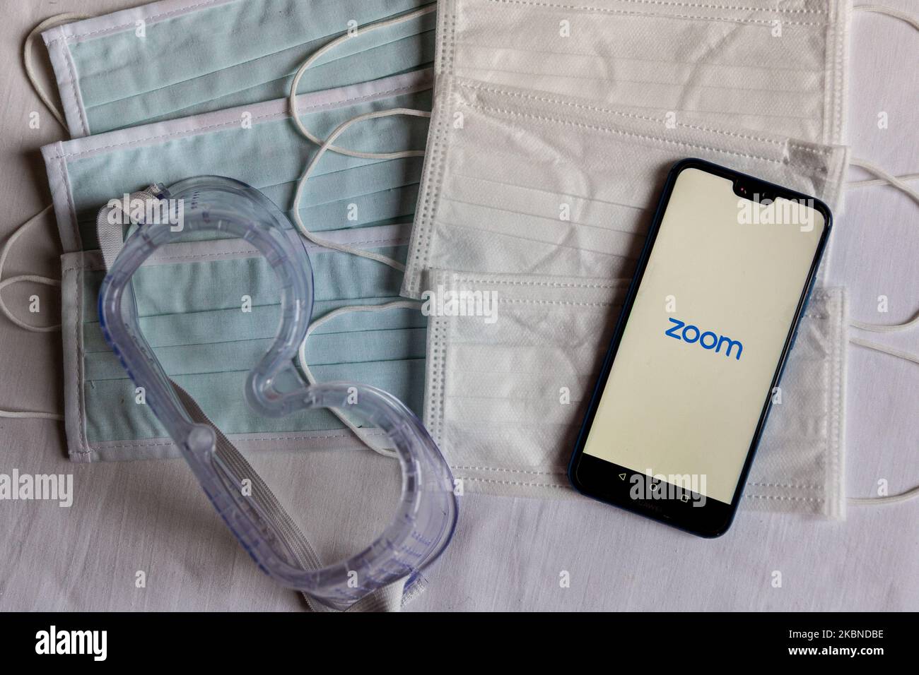 For illustrative purposes a mobile phone with a ZOOM logo is ...