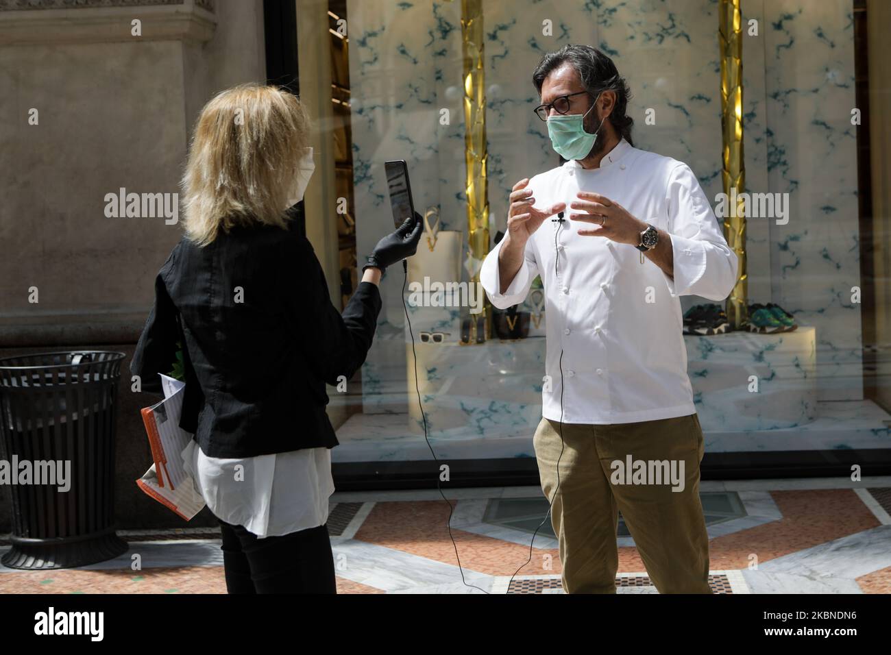 Italian chef Carlo Cracco is seen in front of his restaurant in Duomo ...