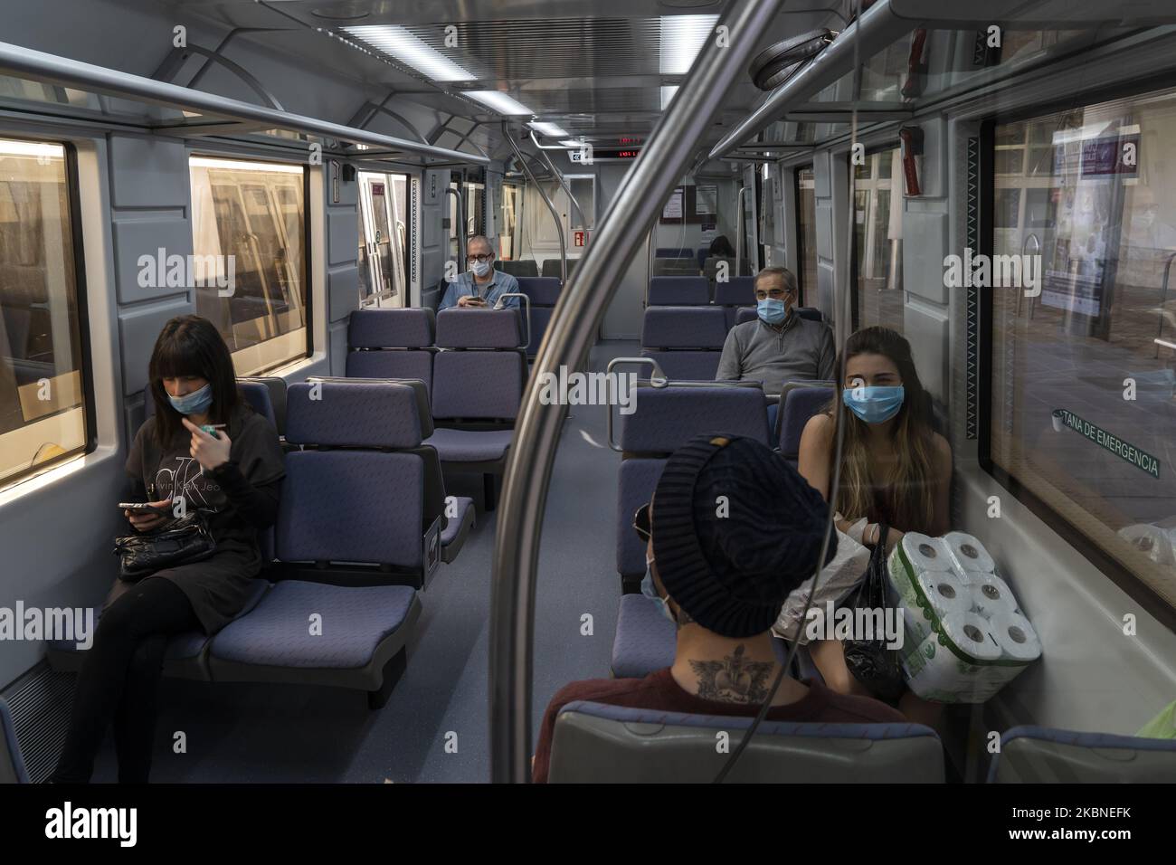 Passengers on a train, all with their masks, since the government of ...