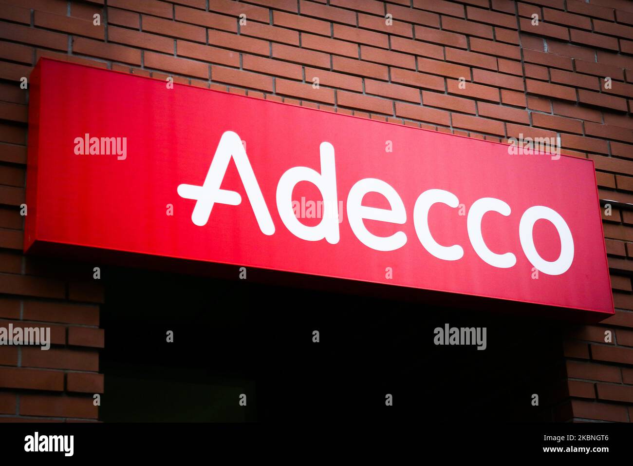 Adecco logo is seen in Krakow, Poland on 16 November, 2018. (Photo by ...