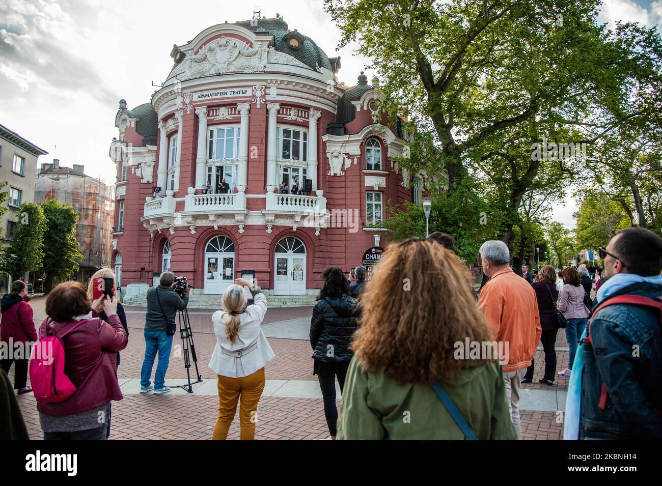 People are gathered in front Varna State Opera to listen the balcony ...