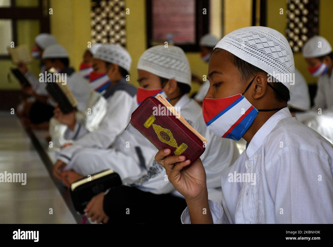 Teenage students read the Quran in Jawa Barat, Indonesia, on May 10 ...