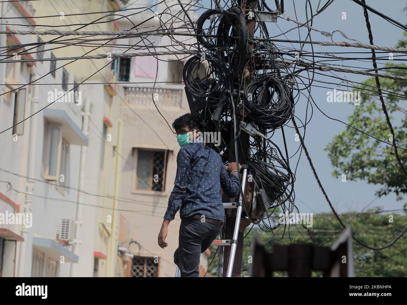 Electrification worker climbs hi-res stock photography and images - Alamy