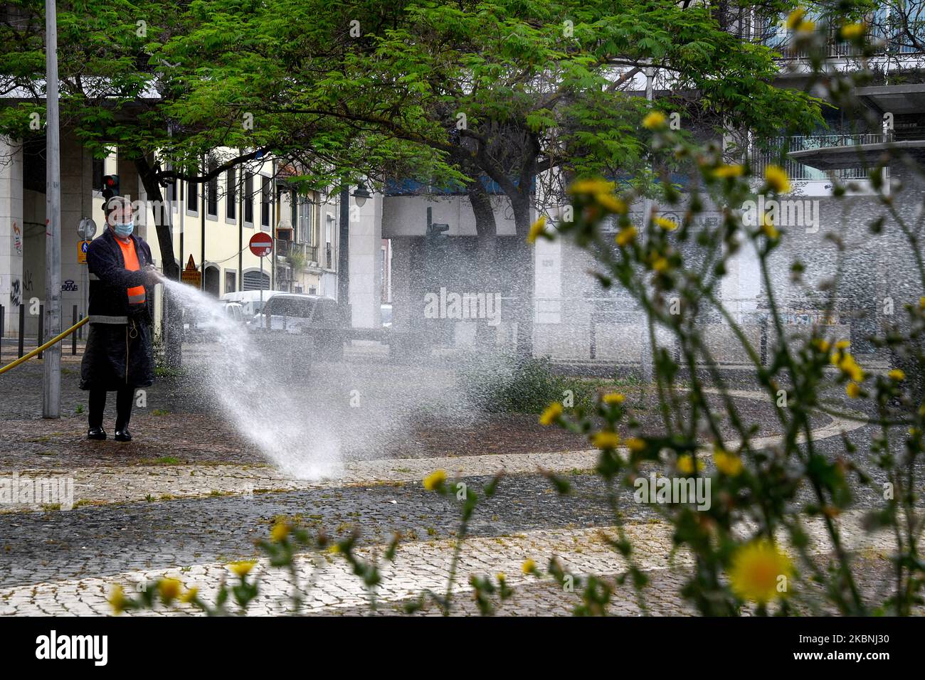 Urban hygiene team washes hi-res stock photography and images - Alamy