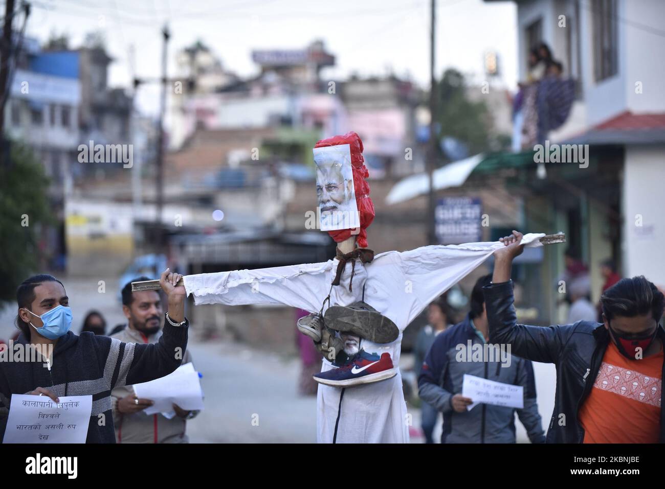 Members of Janta Durbar holds placards with the slogans GO BACK INDIA ...