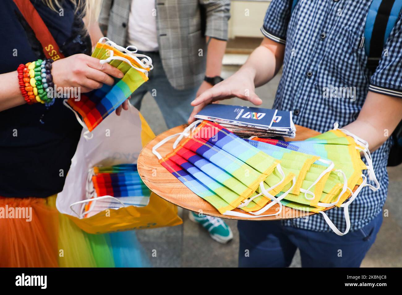 Free rainbow face masks are distributed during coronavirus pandemic by ...