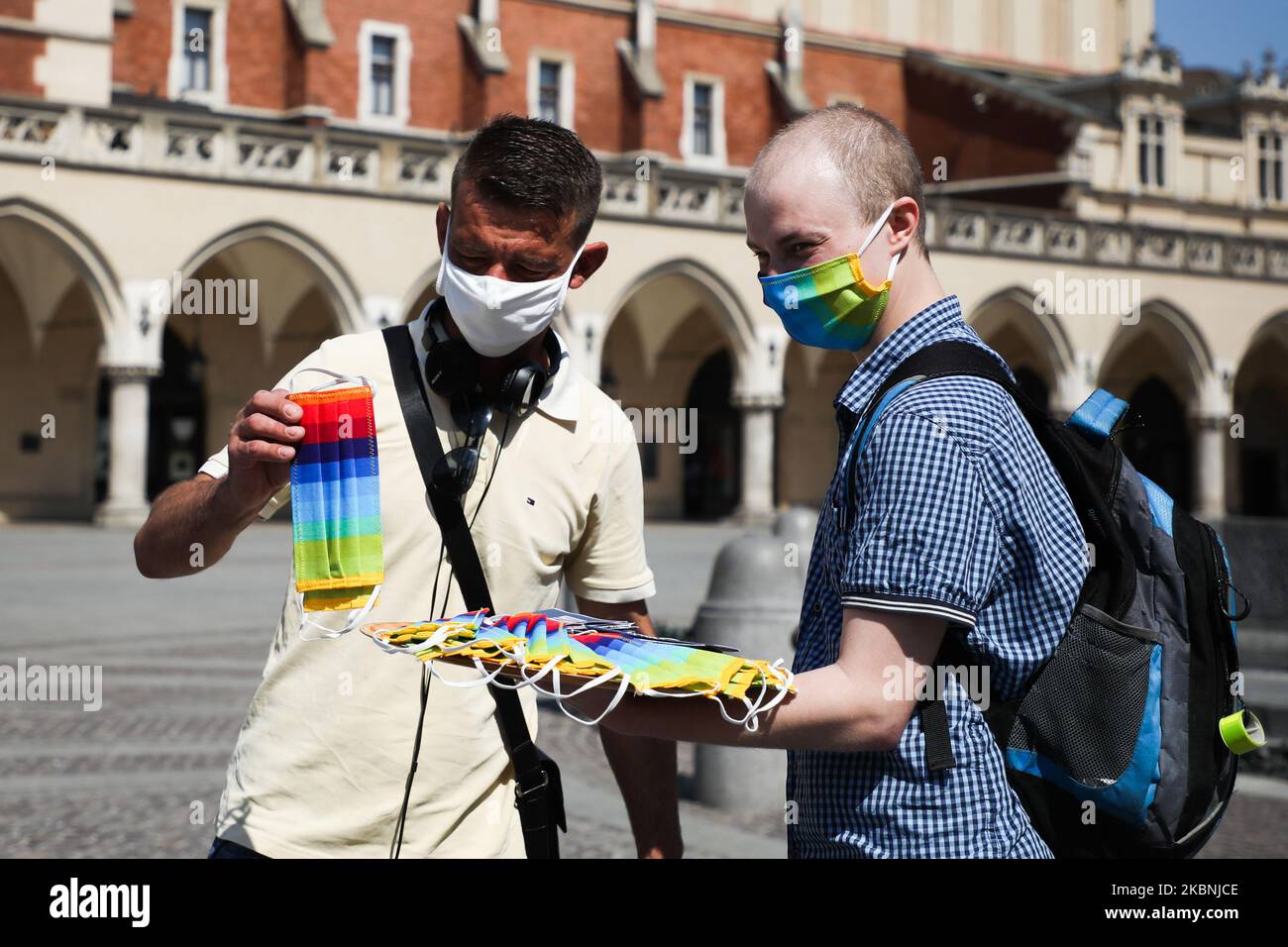 Free rainbow face masks are distributed during coronavirus pandemic by ...
