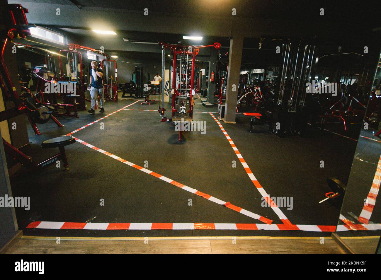 the lines are taped to remind people keep social distance inside World ...