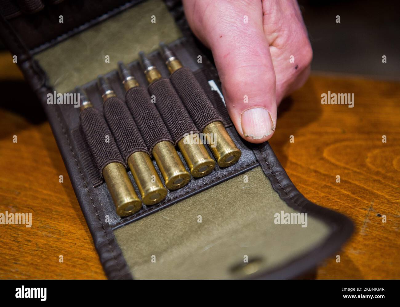 Rifle bullets Holster with five bullets Stock Photo - Alamy
