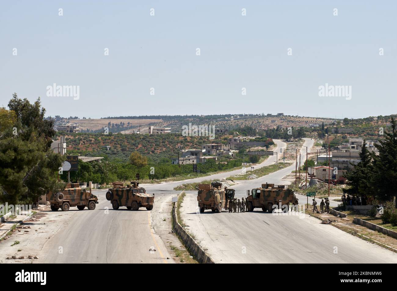 Turkish forces secure a section of the M4 highway, which links the ...