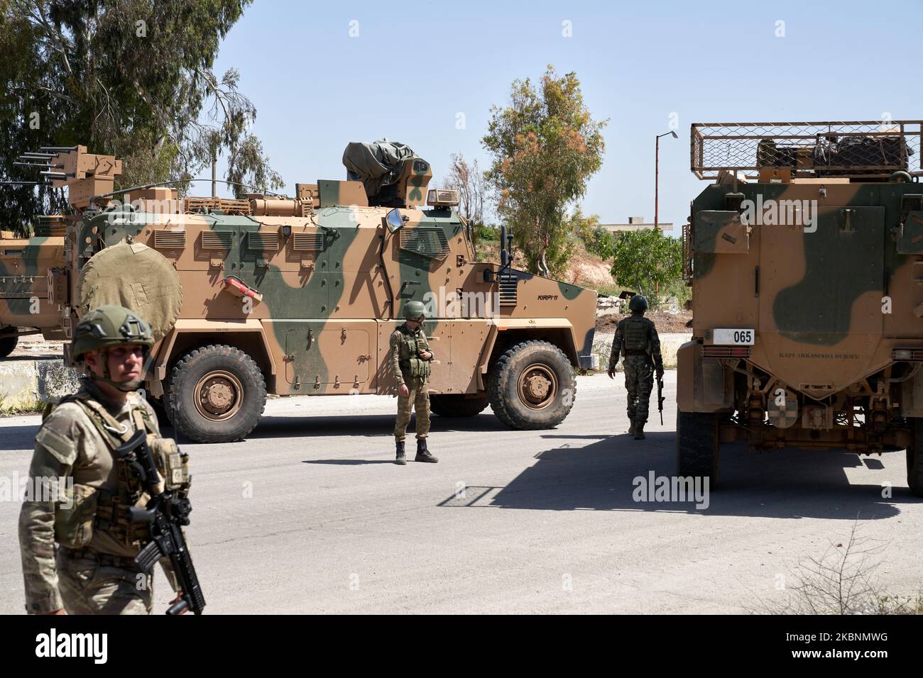 Turkish forces secure a section of the M4 highway, which links the ...