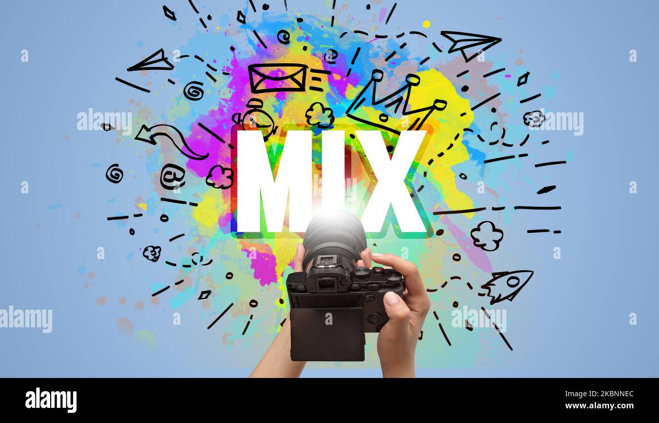 Close-up of a hand holding digital camera with abstract drawing Stock ...