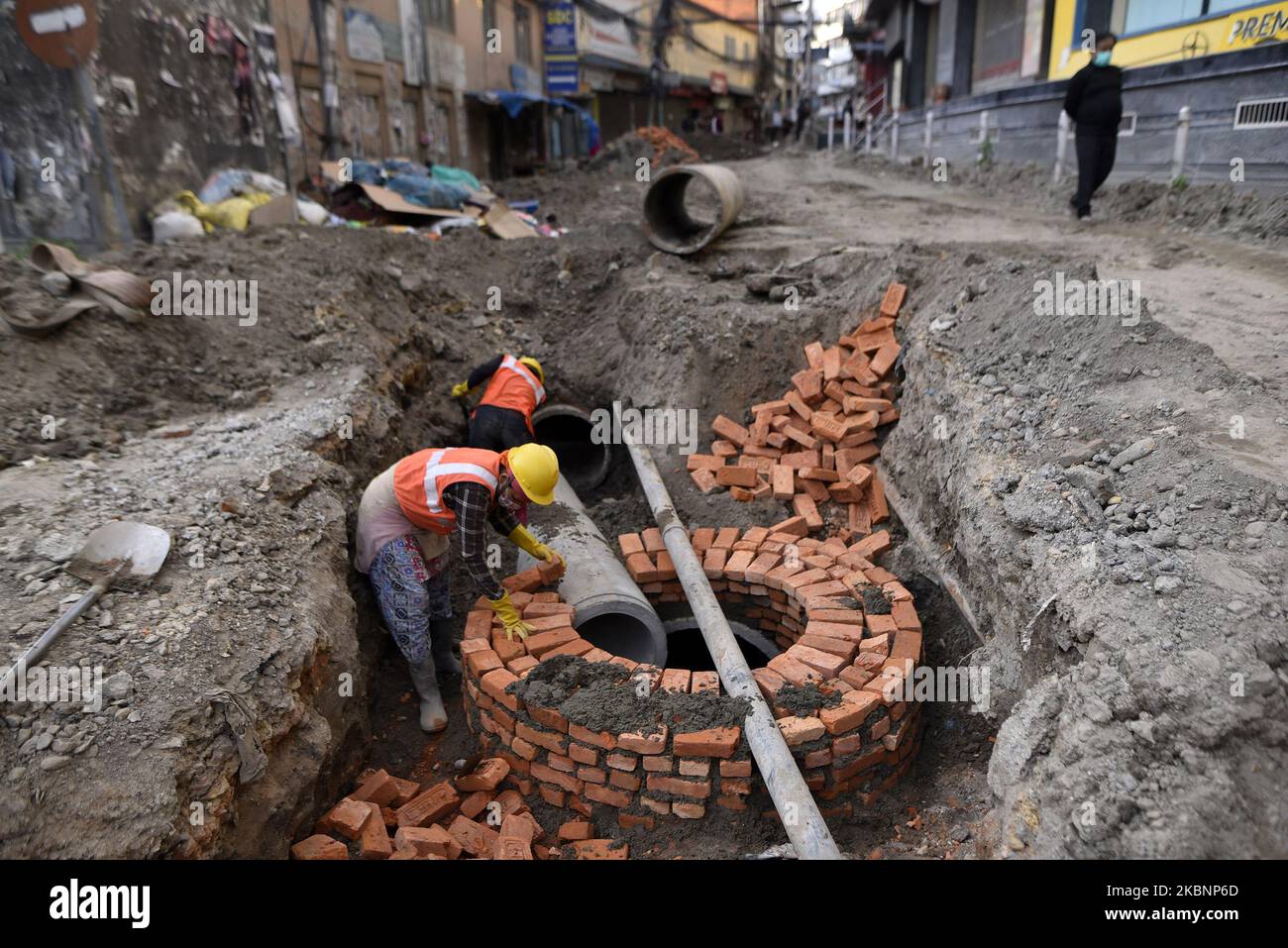 Nepalese workers bhutan hi-res stock photography and images - Alamy