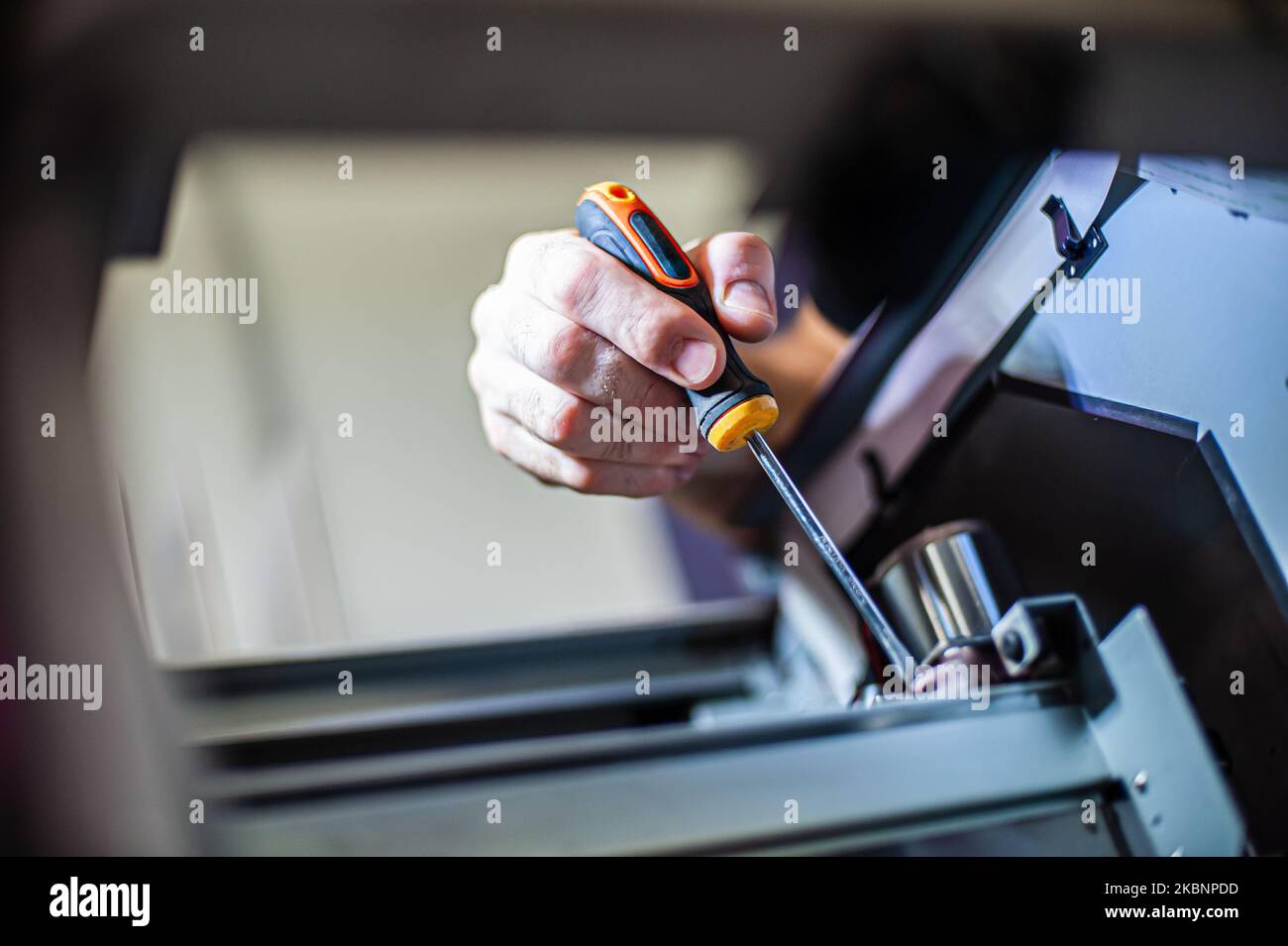 All machines nead maintains. Professional technician troubleshooting ...