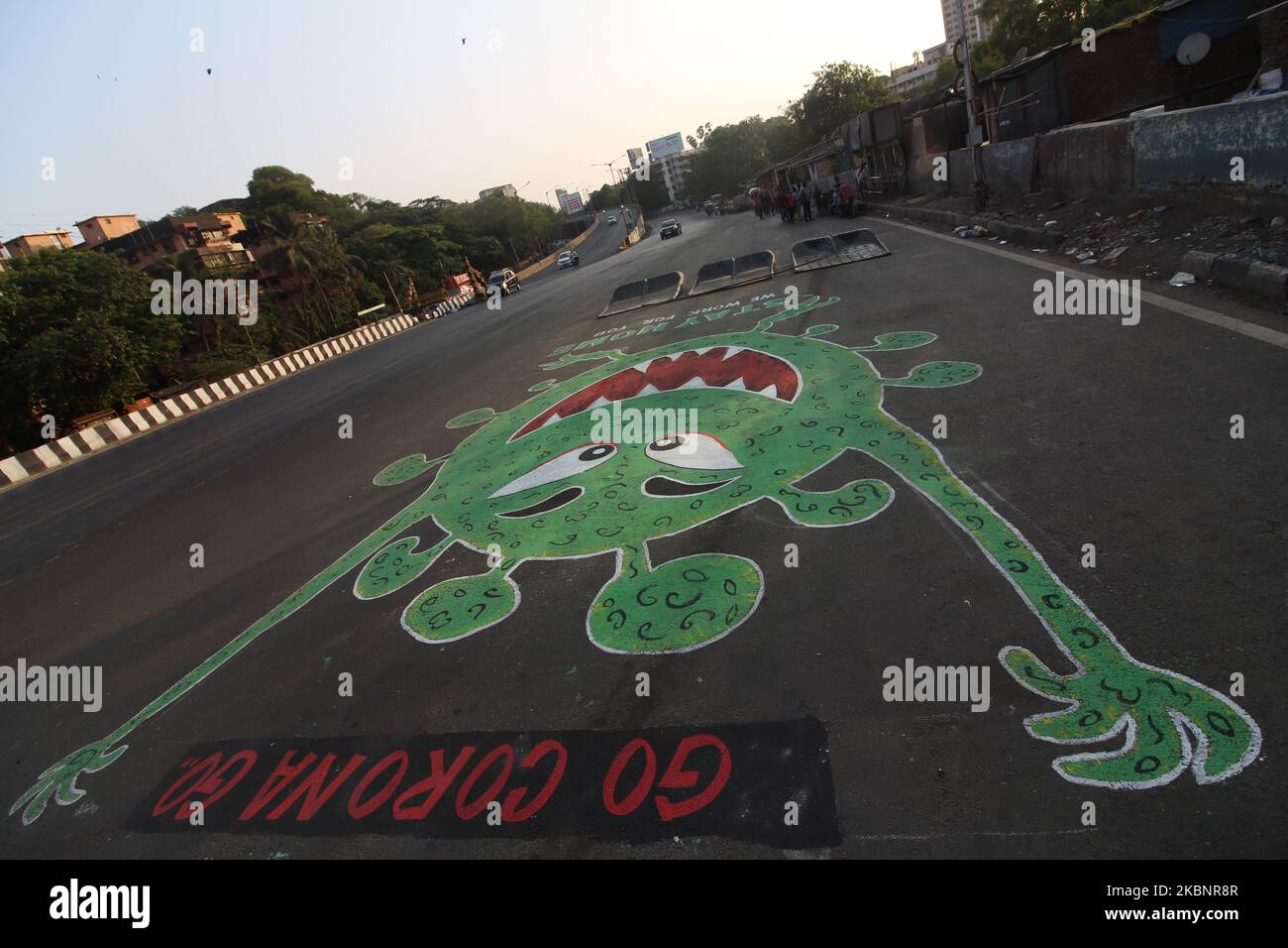 A graffiti depicting the Coronavirus (COVID-19) pandemic is seen on a ...