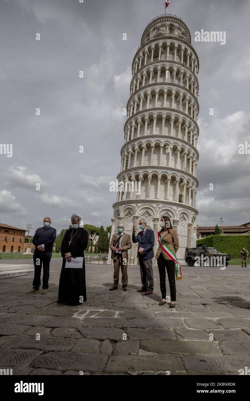 The Archbishop Giovanni Paolo Benotto with Imam Mohammad Khalil praying together under the ...