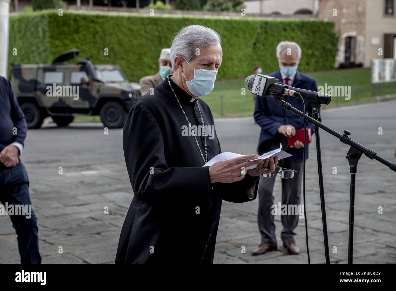 The Archbishop Giovanni Paolo Benotto with Imam Mohammad Khalil (not in picture) praying ...