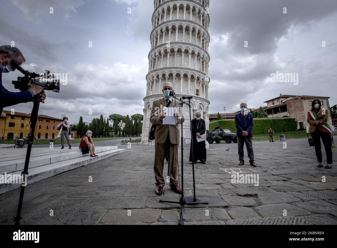 The Archbishop Giovanni Paolo Benotto with Imam Mohammad Khalil praying together under the ...