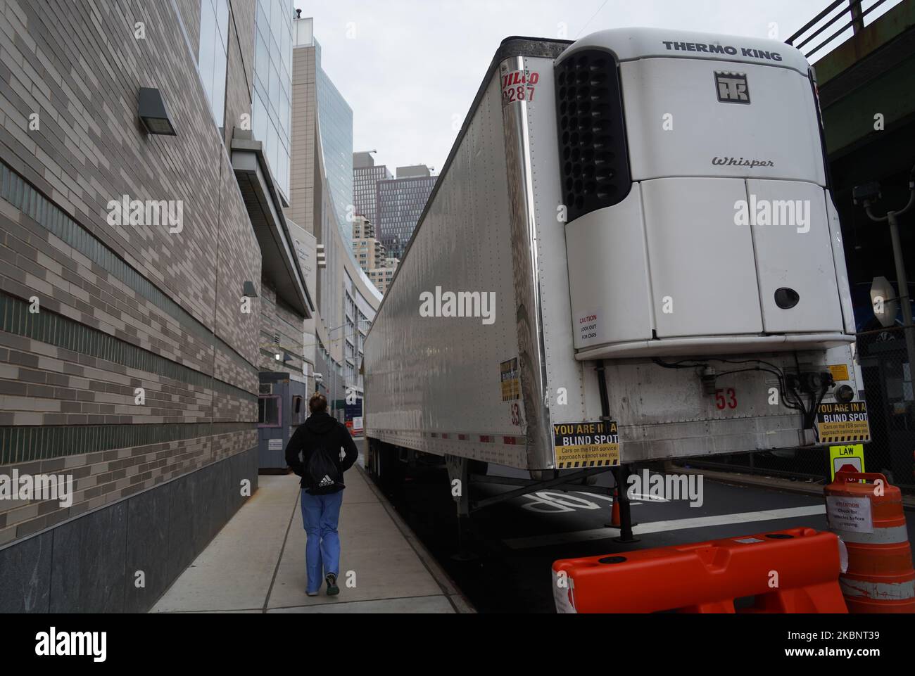 A refrigerated truck serves as a temporary morgue behind the NYU ...