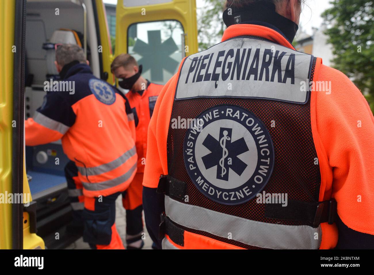 A team of paramedics next to a new ambulance. Today, two hospitals in ...
