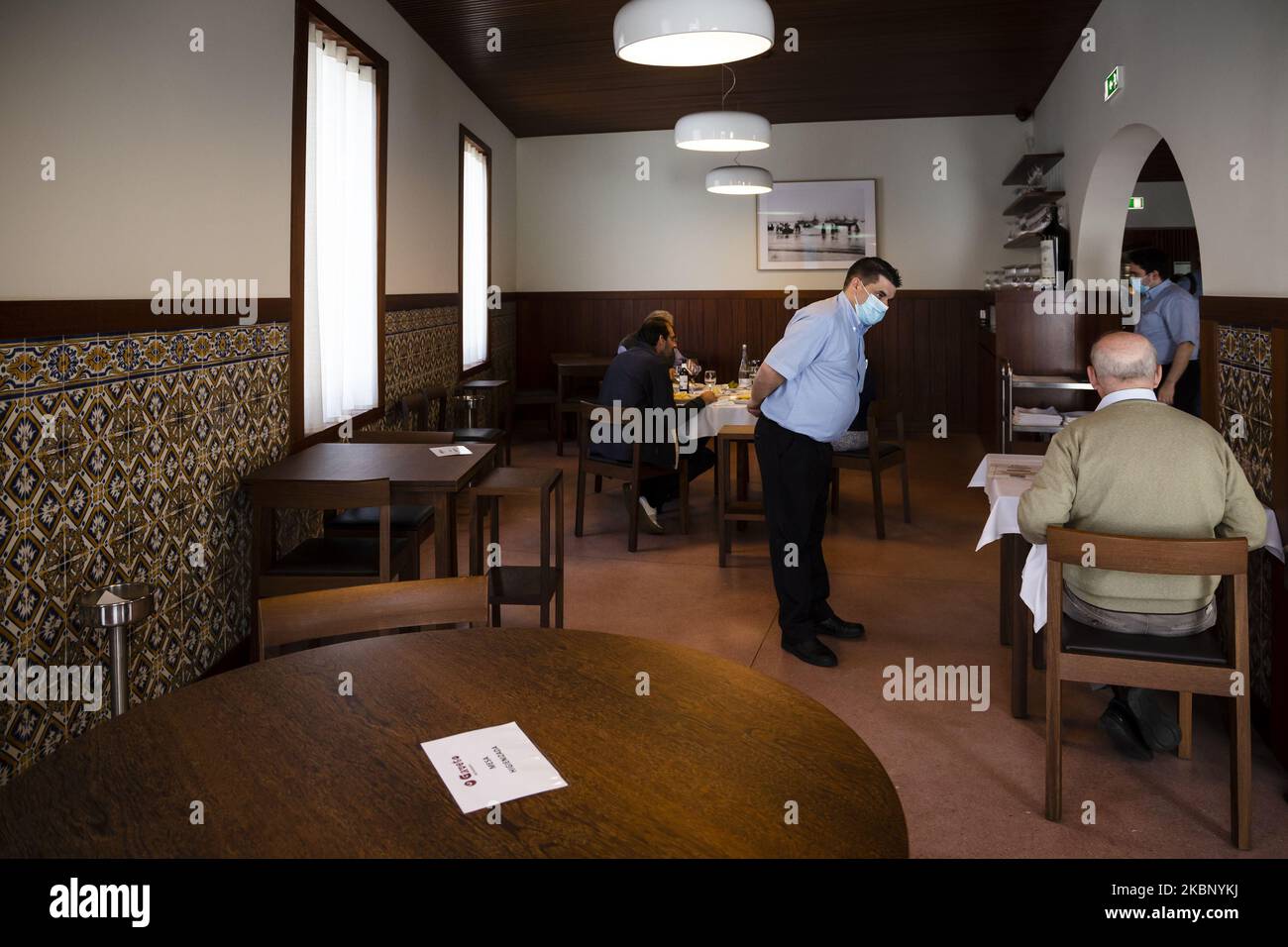 View of a restaurant room, with the necessary distance between tables ...