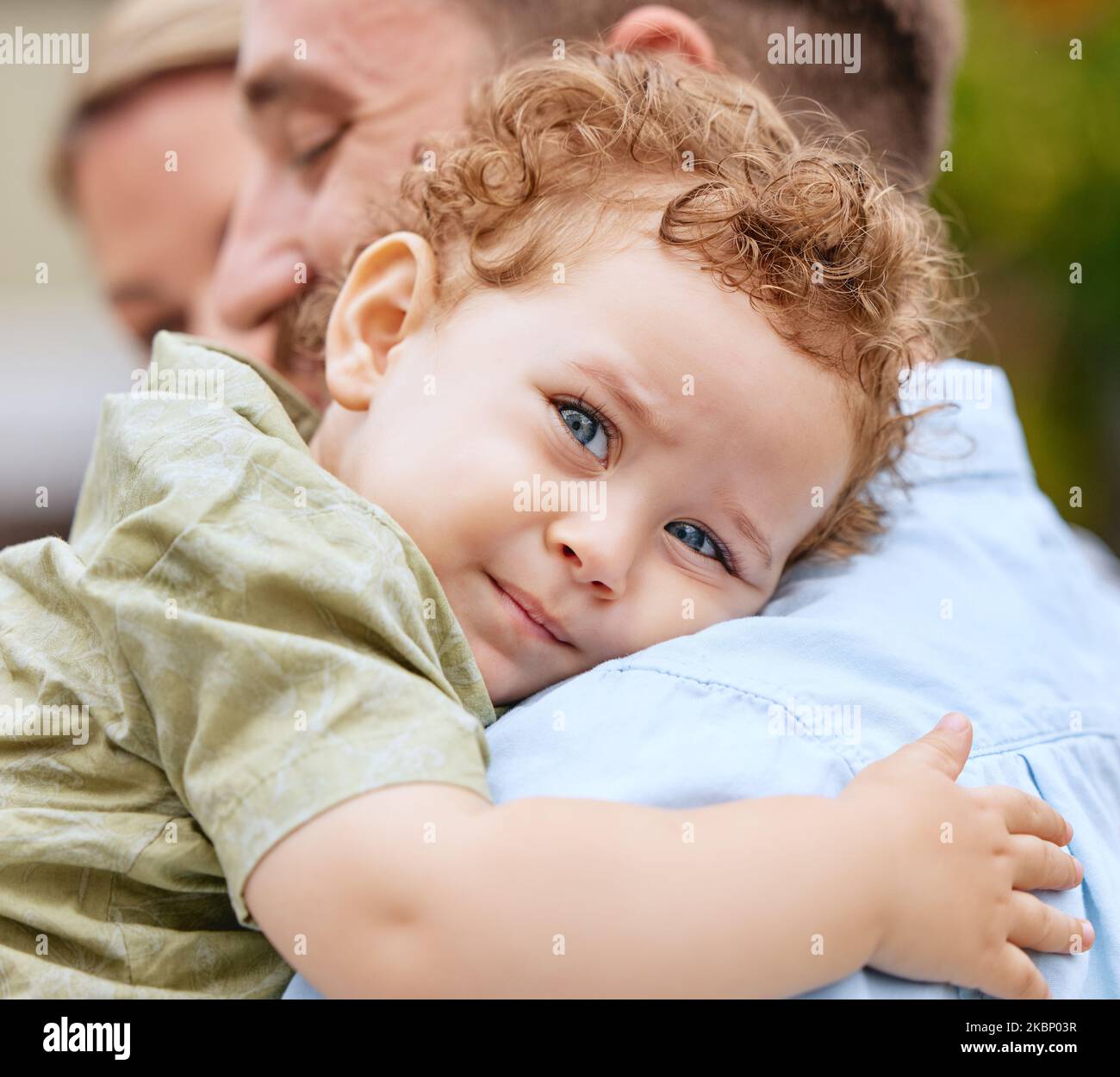 Baby, love and family with a boy hugging his father while spending time ...