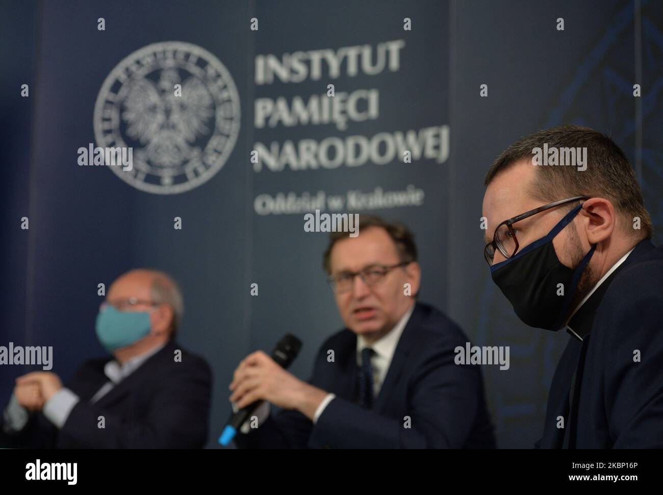 (L-R) Andrzej Grajewski, Jaroslaw Szarek, father Adam Pawlaszczyk, seen ...