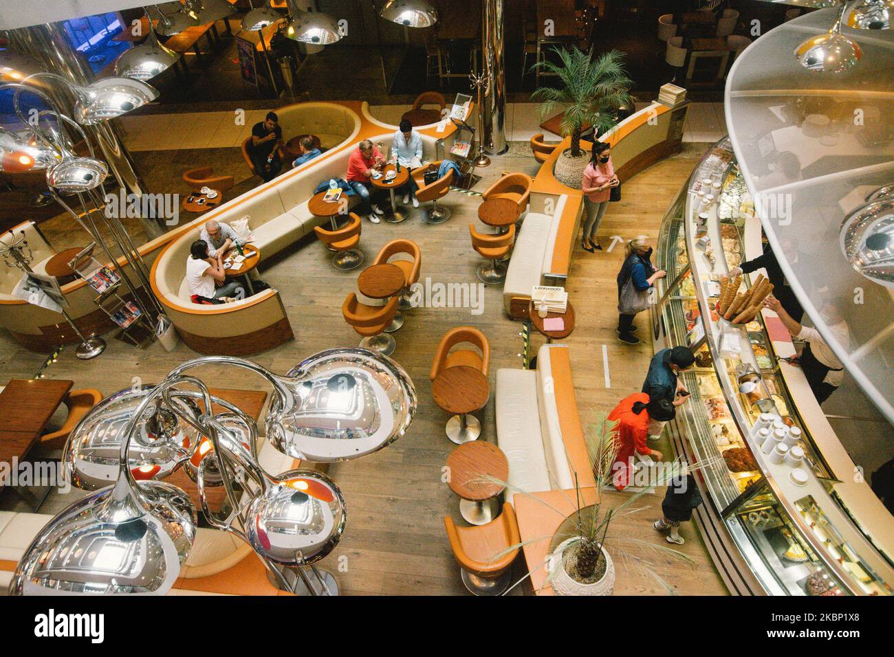 A cafe is seen with few guests inside a shopping mall in Dusseldorf ...
