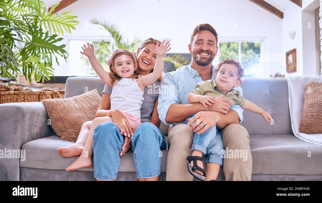 Happy family portrait, parents and kids relax on living room sofa ...