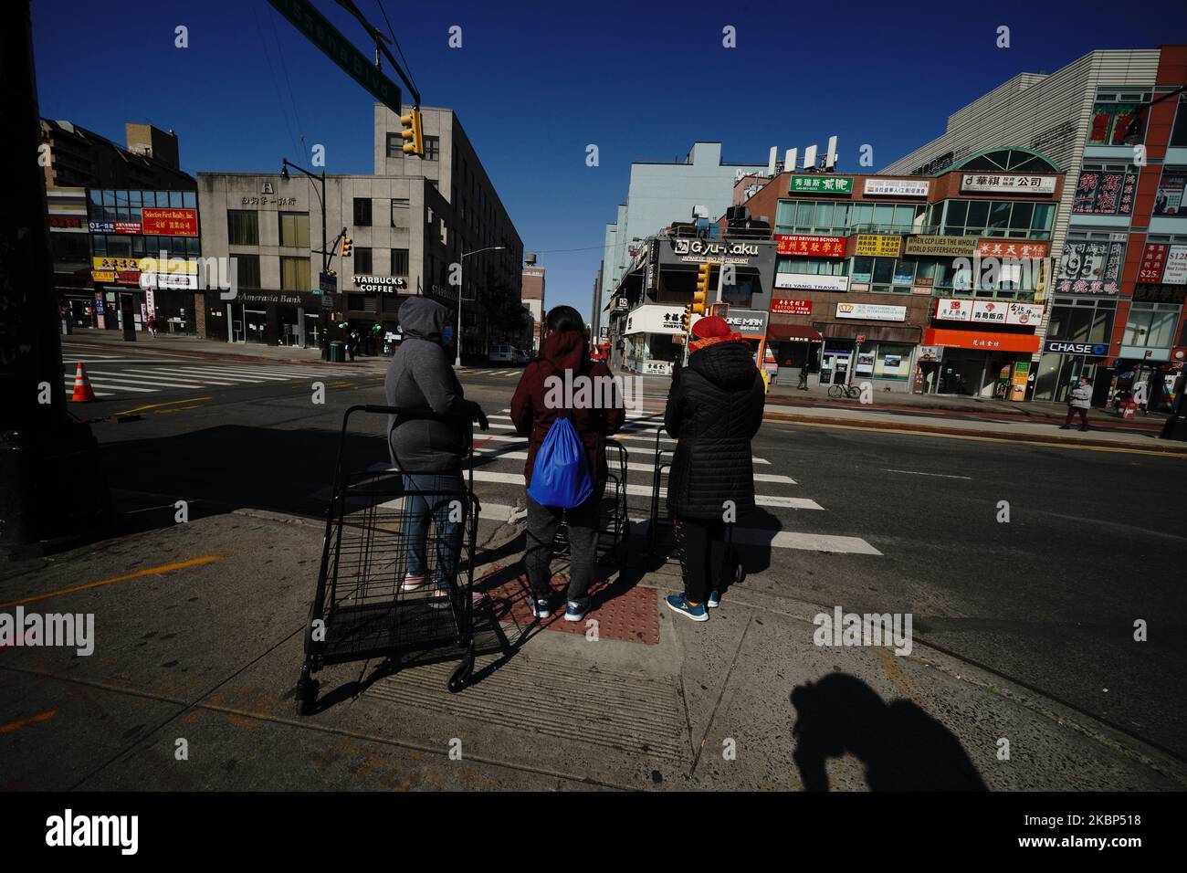 A view of people pushing shopping carts during the coronavirus pandemic ...