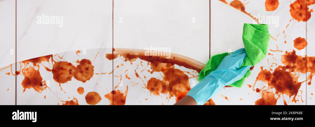 Cleaning Dirty Floor Stain. Person Hand Cleaning Spilled Food Stock ...