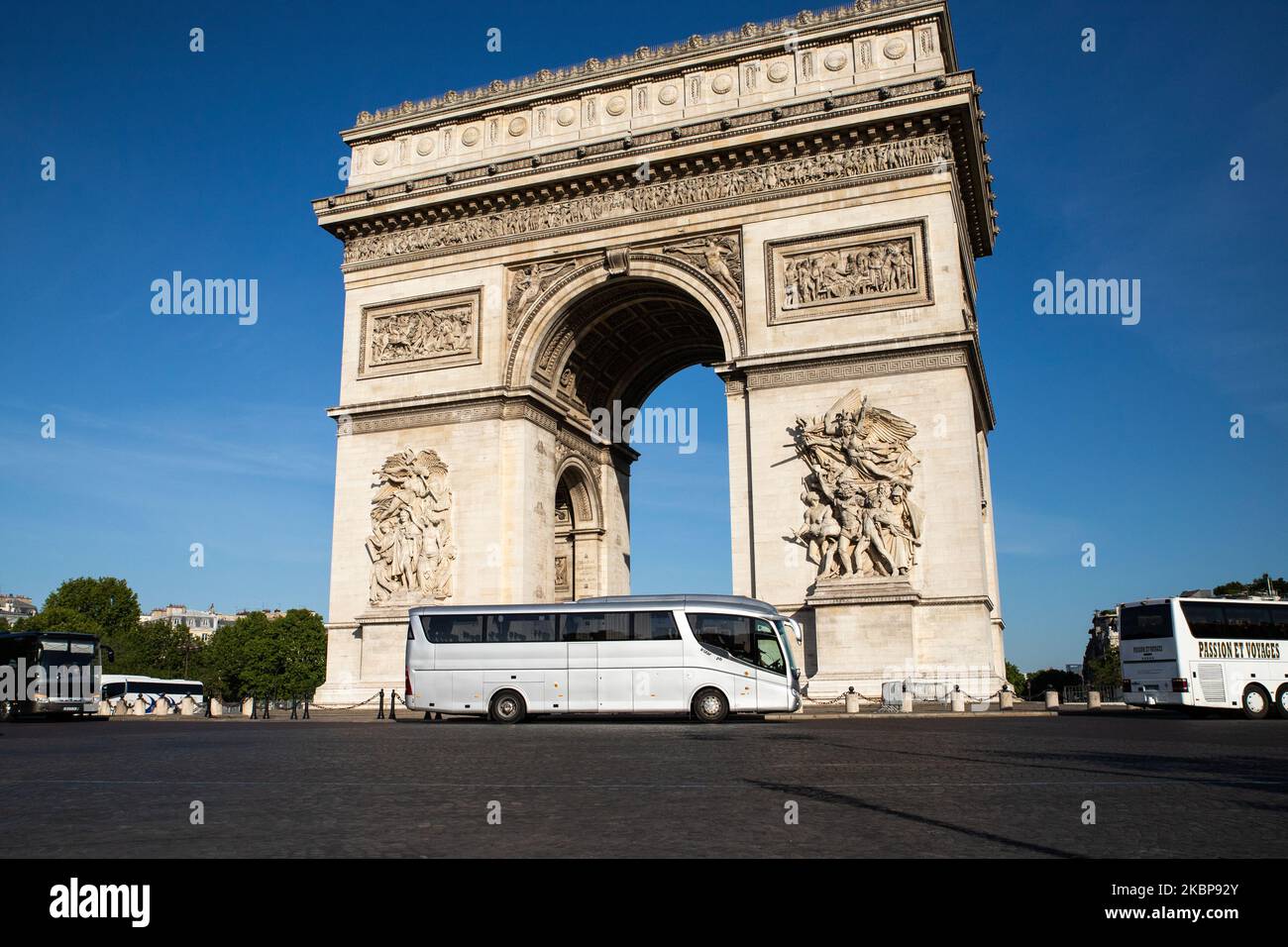 A dozen of employees of buses tourism companies protest around the Arc ...