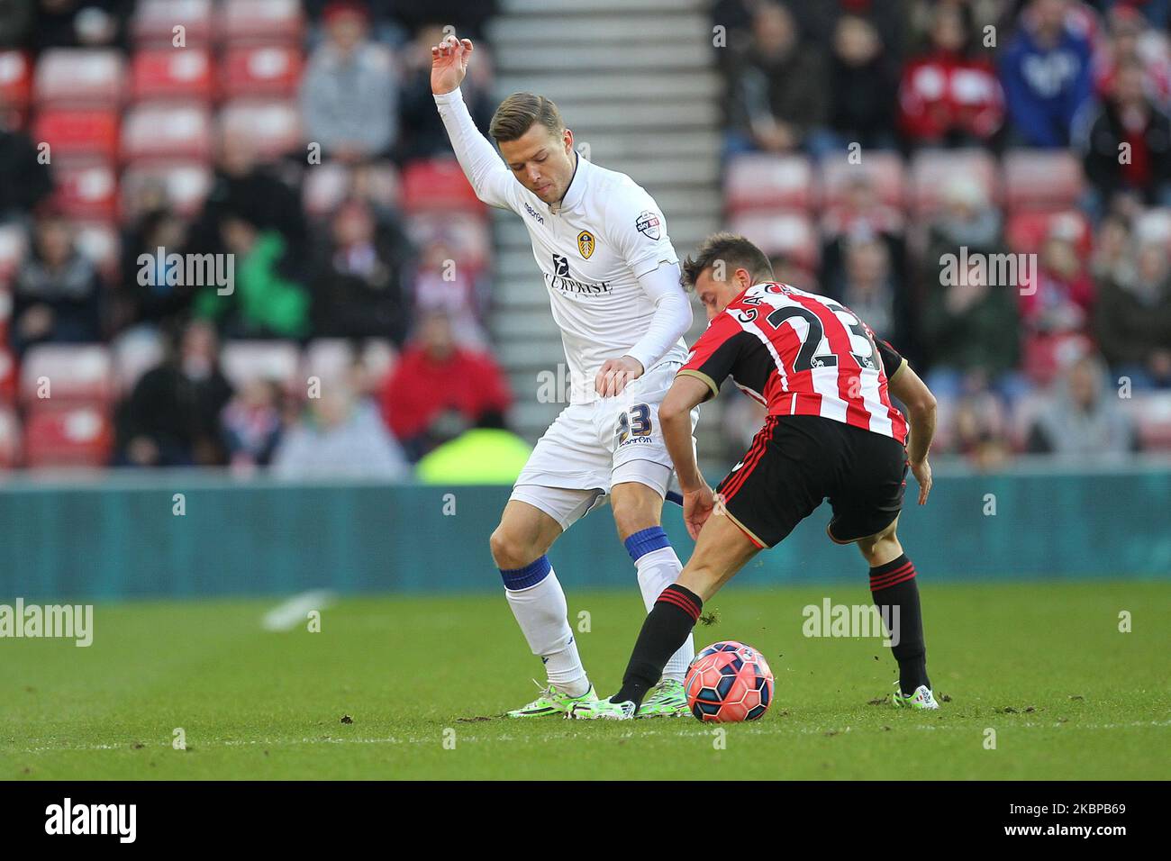 Casper Sloth of Leeds United battles for possession of the ball with ...