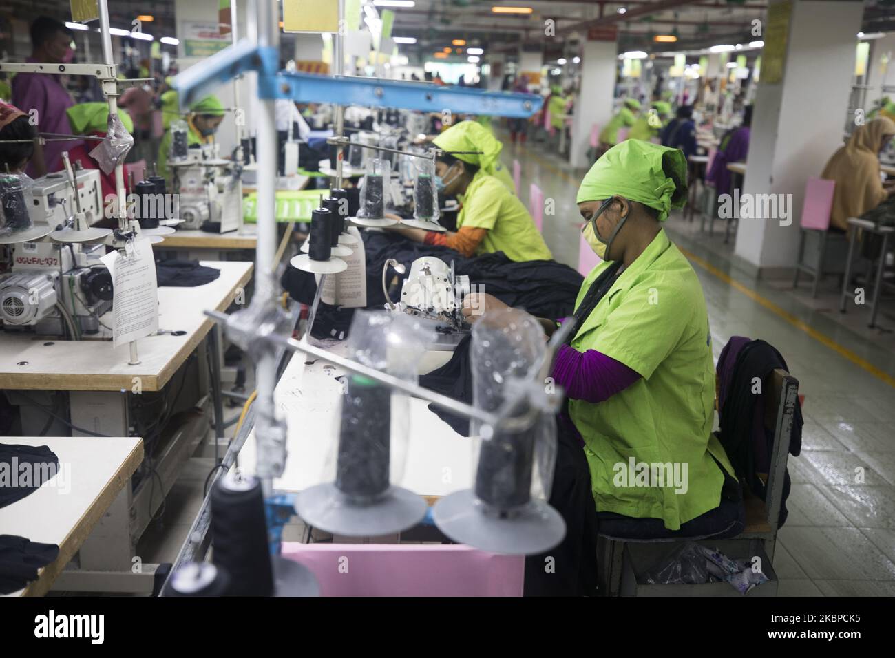 Workers work in a garment factory in Dhaka, Bangladesh on May 28, 2020 ...