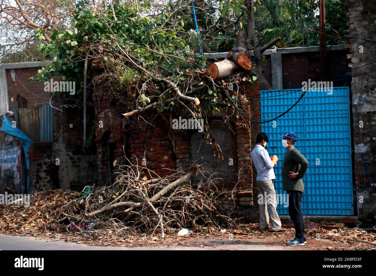 People Stand at front of Damage House in the aftermath Super Cyclone ...
