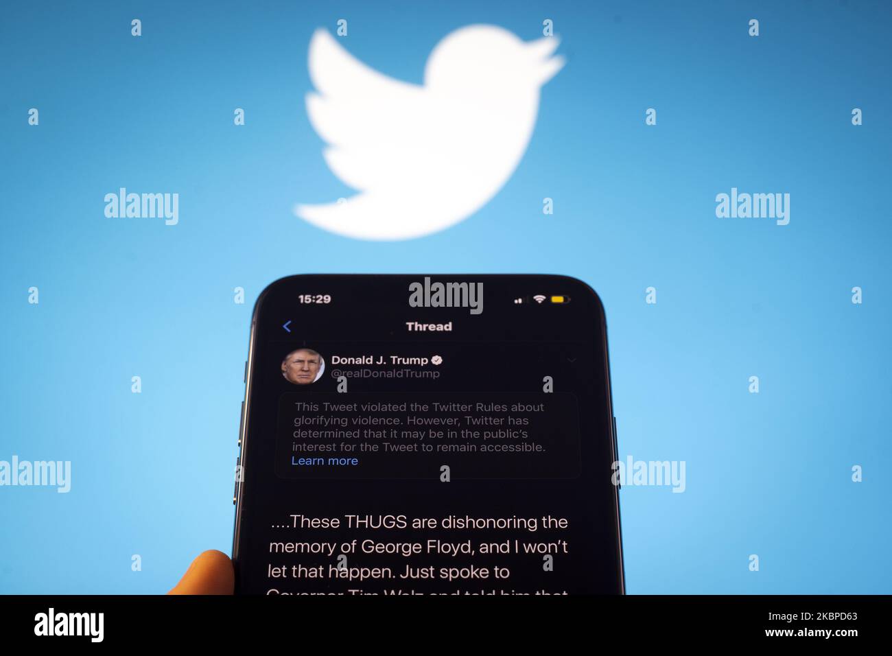 A tweet by US president Donald Trump is seen being flagged as inciting ...