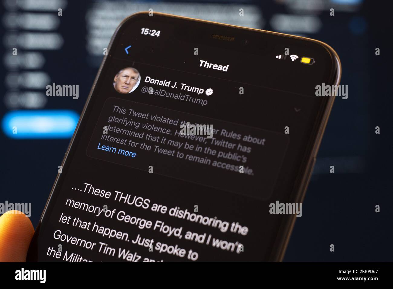 A tweet by US president Donald Trump is seen being flagged as inciting ...