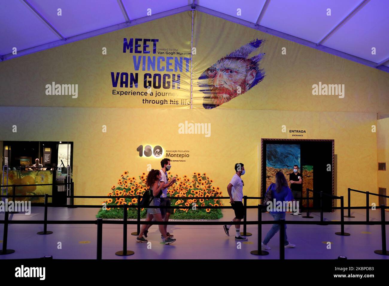 Visitors wearing face masks attend the â€ Meet Vincent Van Gogh ...