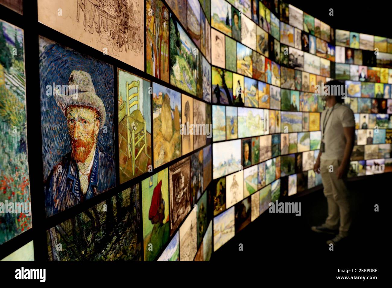 A visitor wearing a face mask attends the â€ Meet Vincent Van Gogh ...