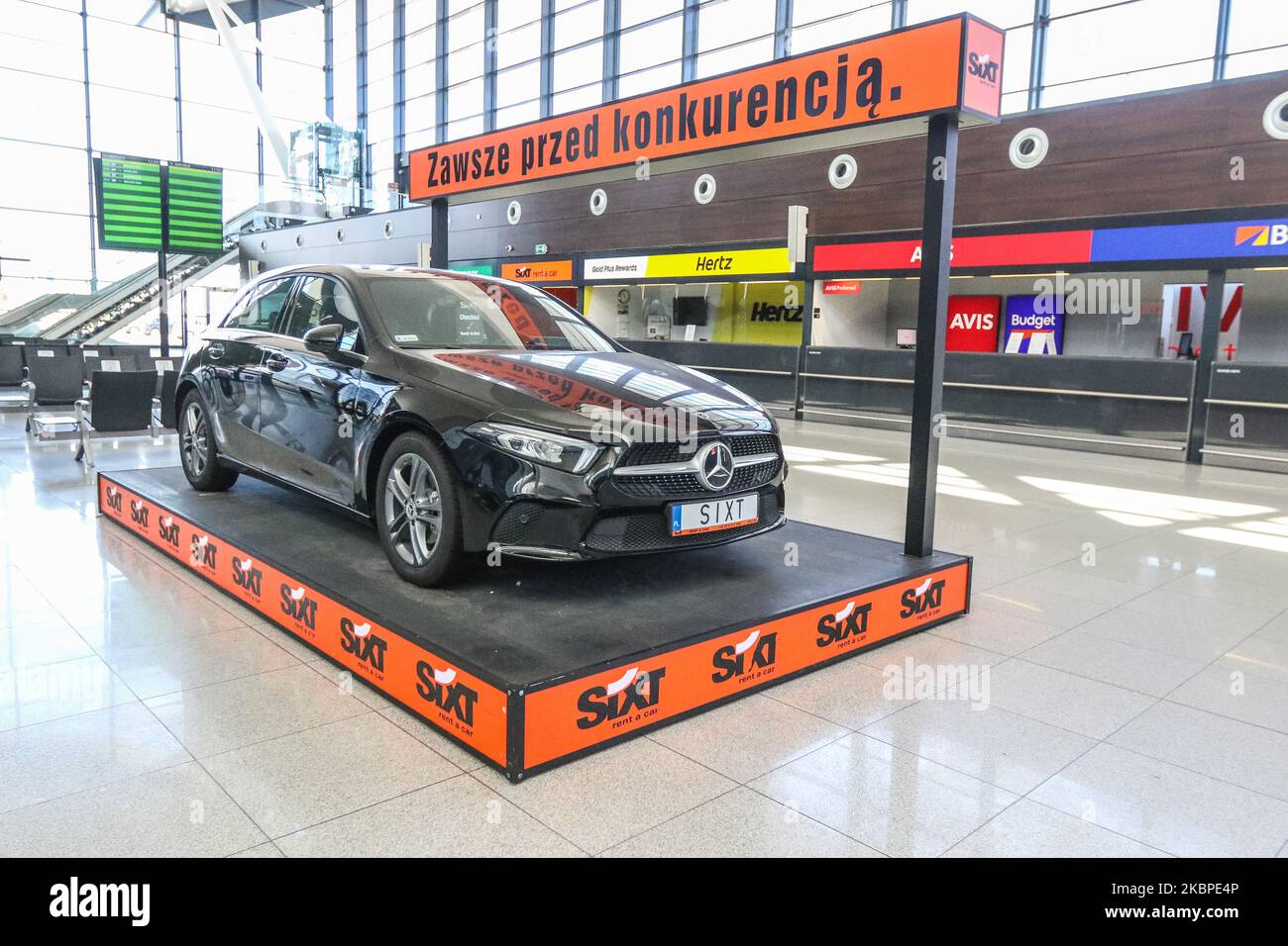 SIXT car rental stand with a Mercedes car displayed is seen at the ...