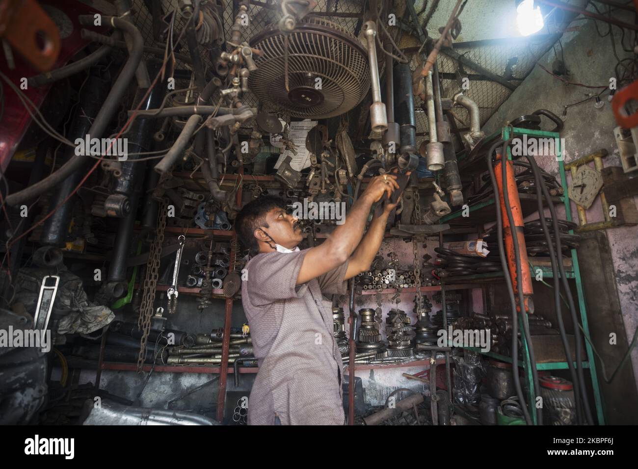 A bus mechanic preparing to open his shop after over two months in ...