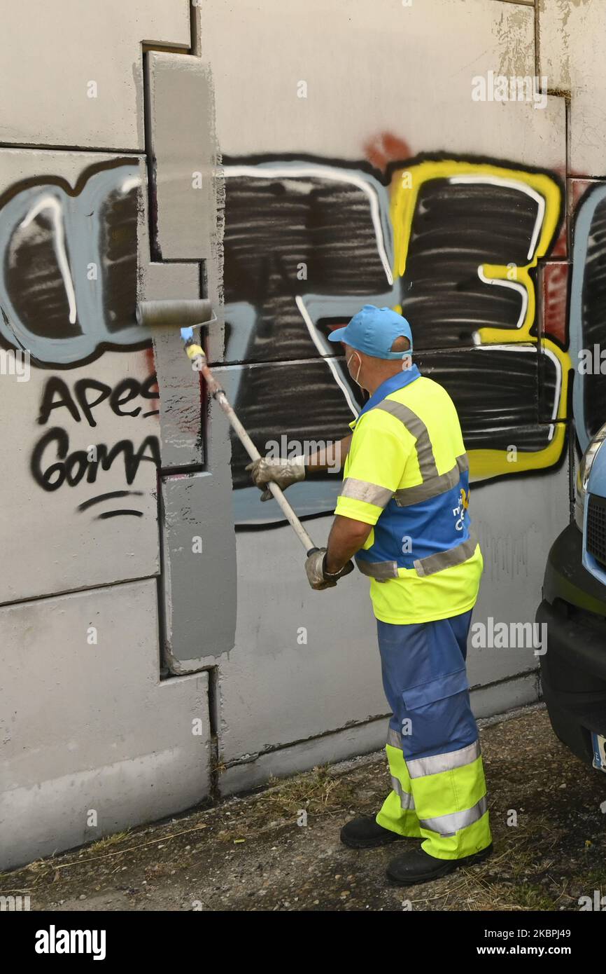 Municipal workers are cleaning graffiti in Madrid, Spain, on 1st June ...