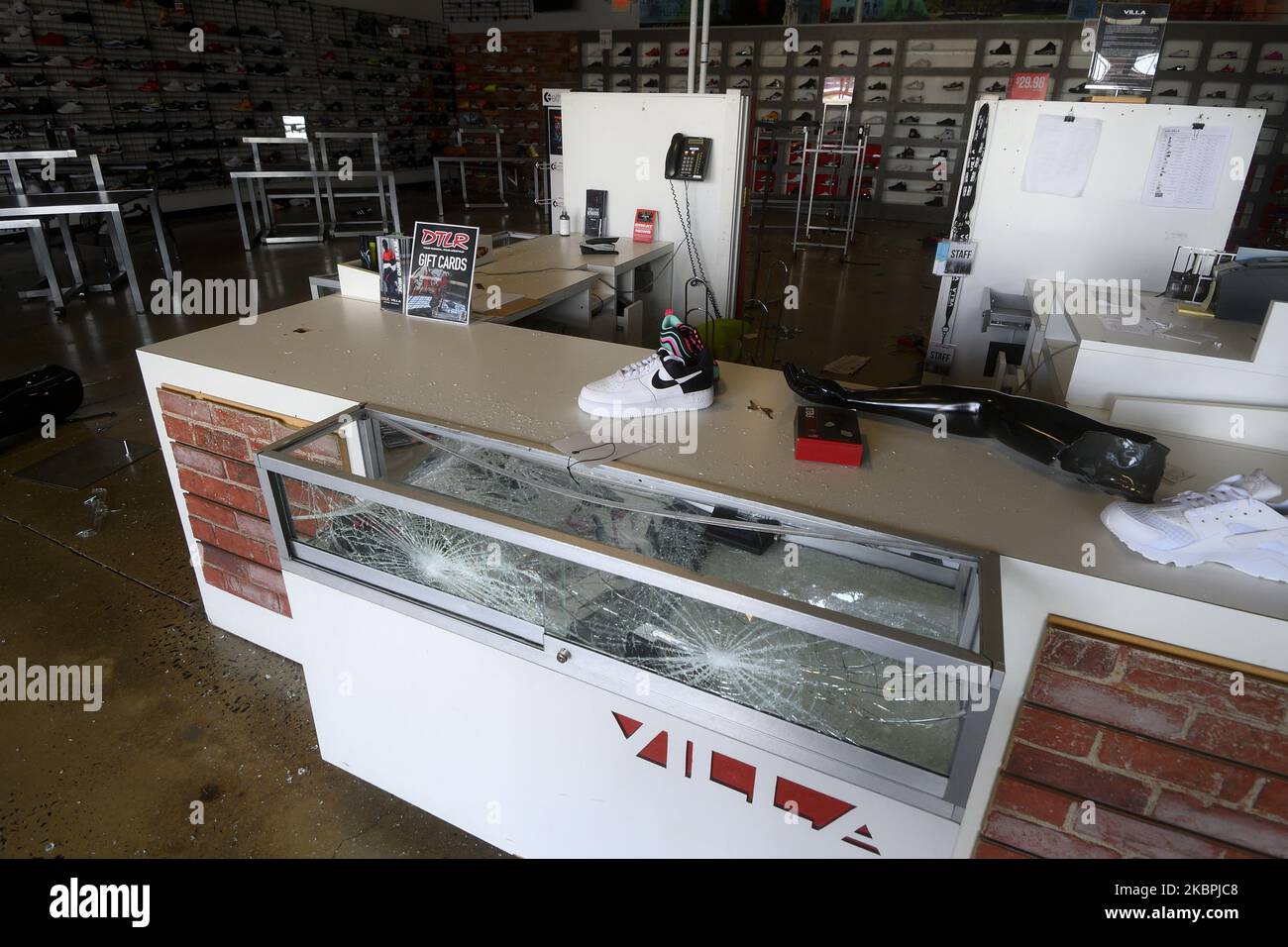 Interior view of a ransacked sneaker store wall in the Mt Airy ...