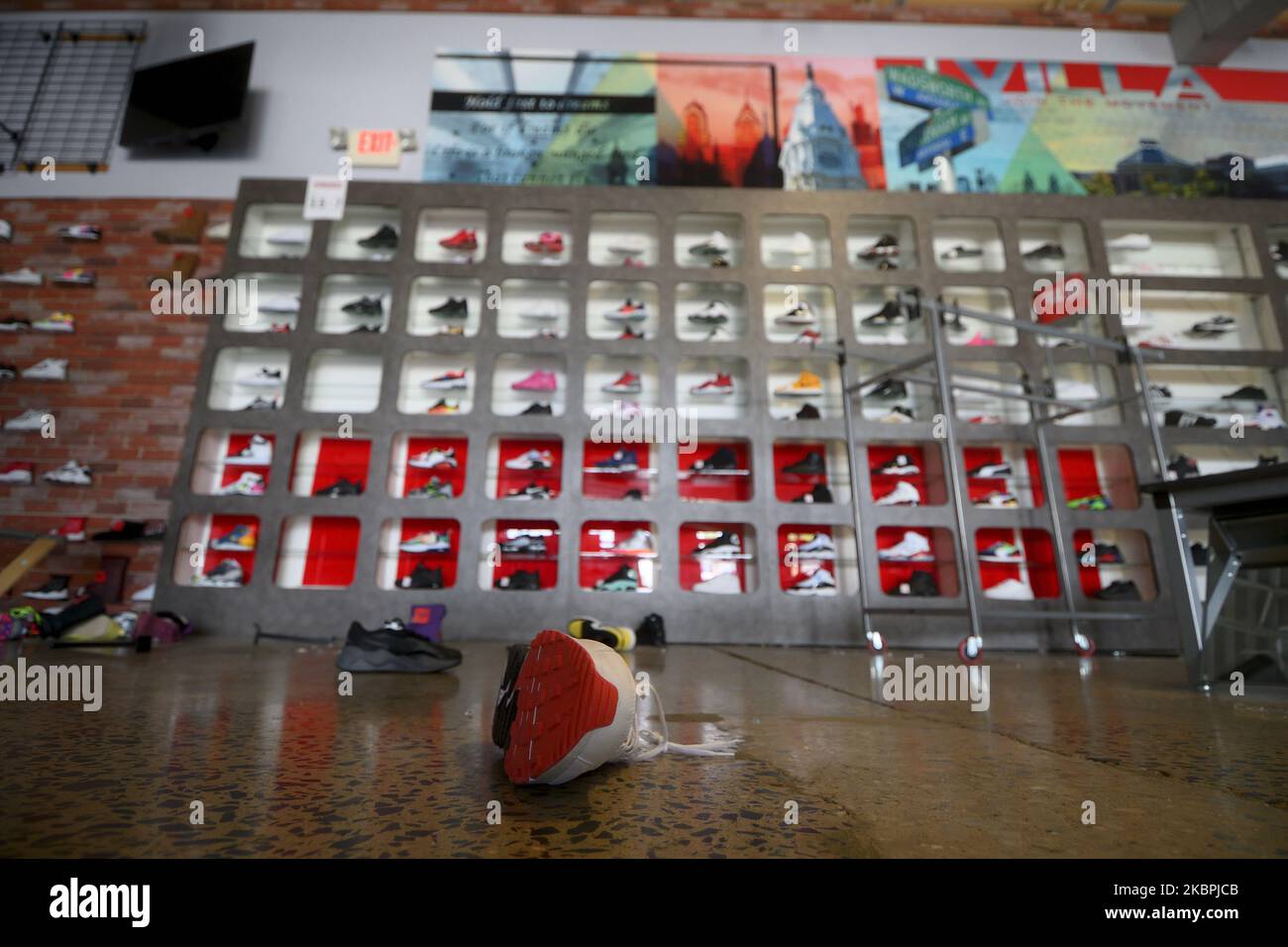 Interior view of a ransacked sneaker store wall in the Mt Airy ...