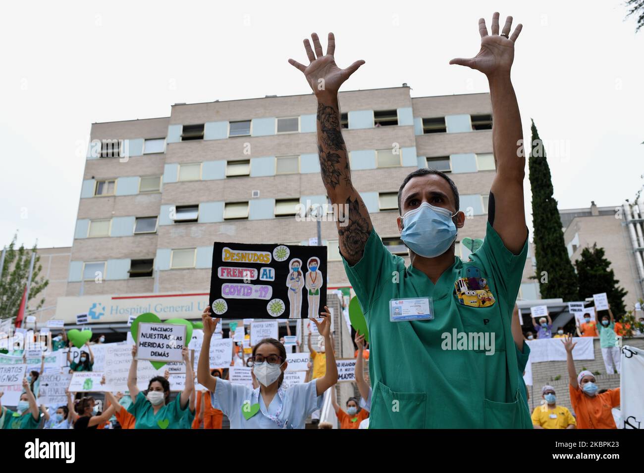 Healthcare workers protest outside the Gregorio Marañón hospital in ...